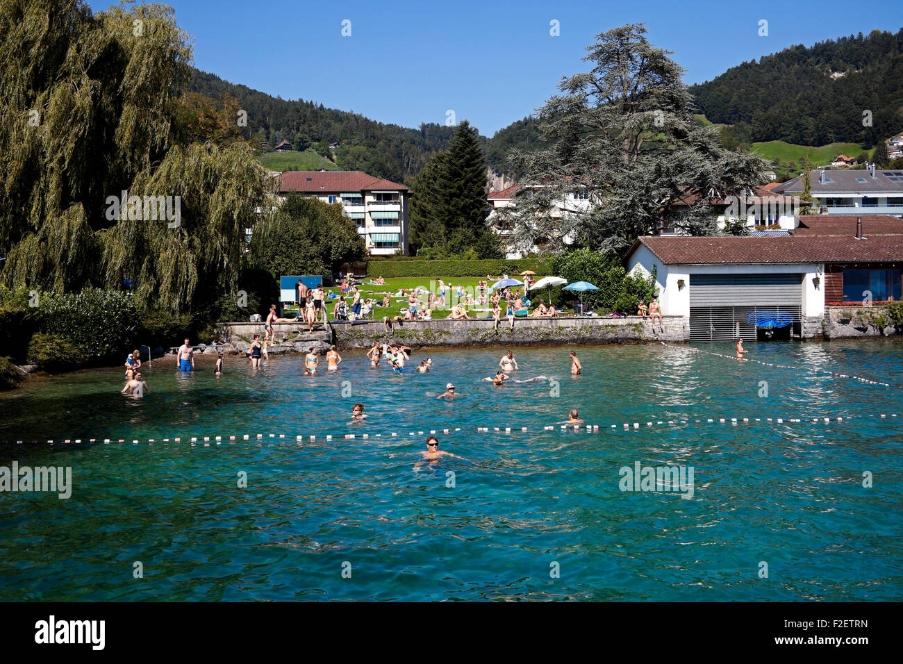 Switzerland sunbathing lake Europe Stock Photo - Alamy