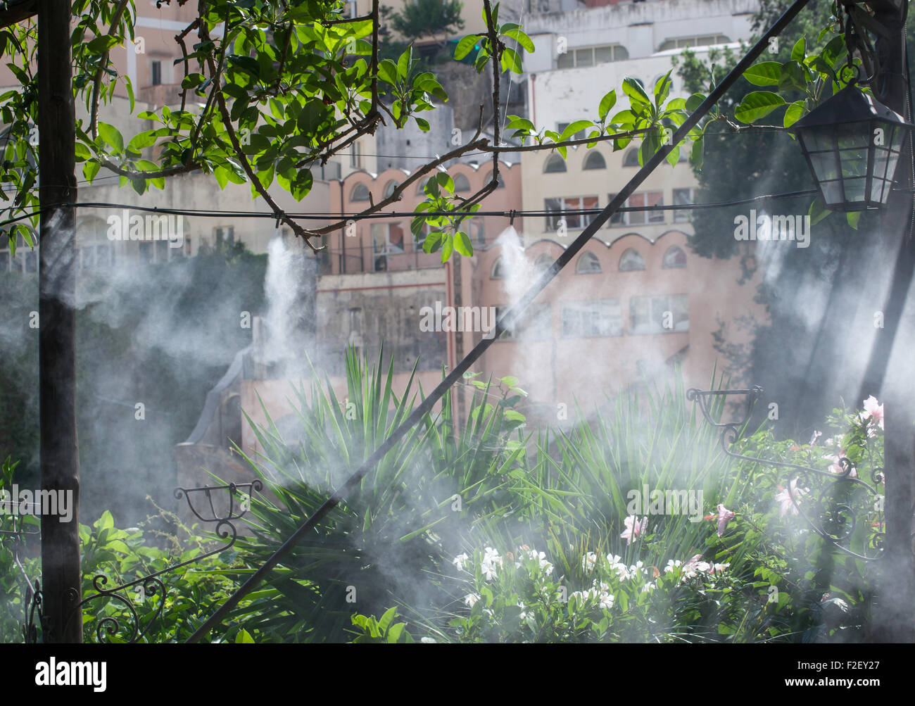 Nebulization system water for commercial premises in summer Stock Photo ...