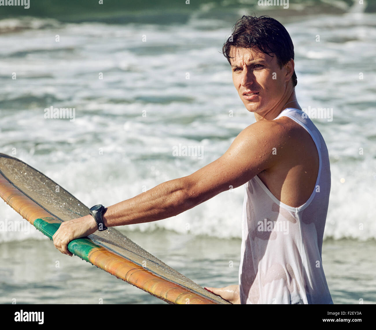 Portrait of Surfer with longboard on the beach Stock Photo - Alamy