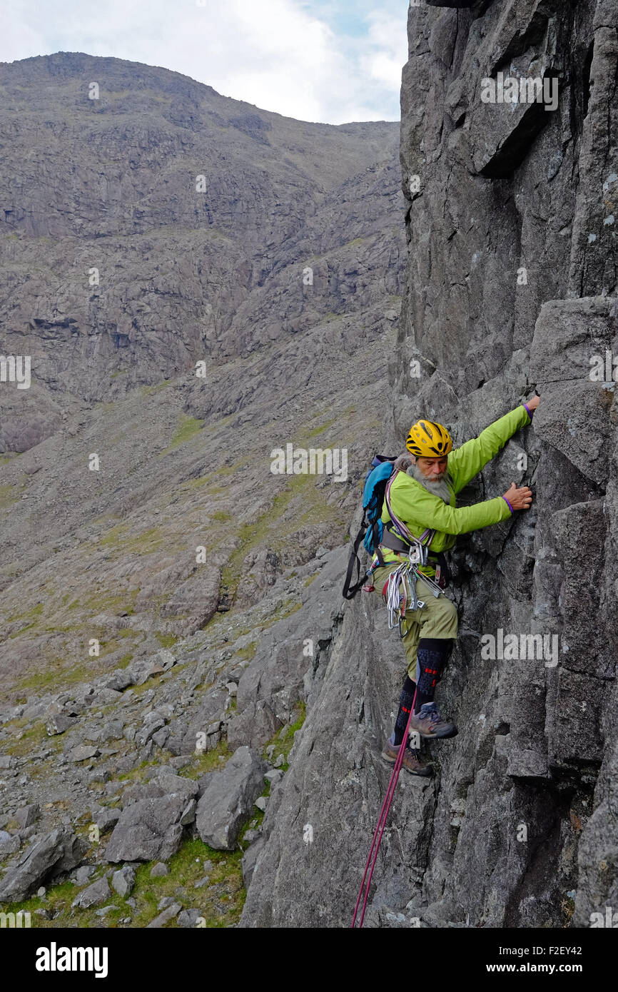 Man climbing window hi-res stock photography and images - Alamy