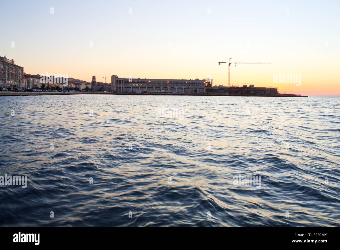 View of Trieste harbor at sunset, Italy Stock Photo - Alamy