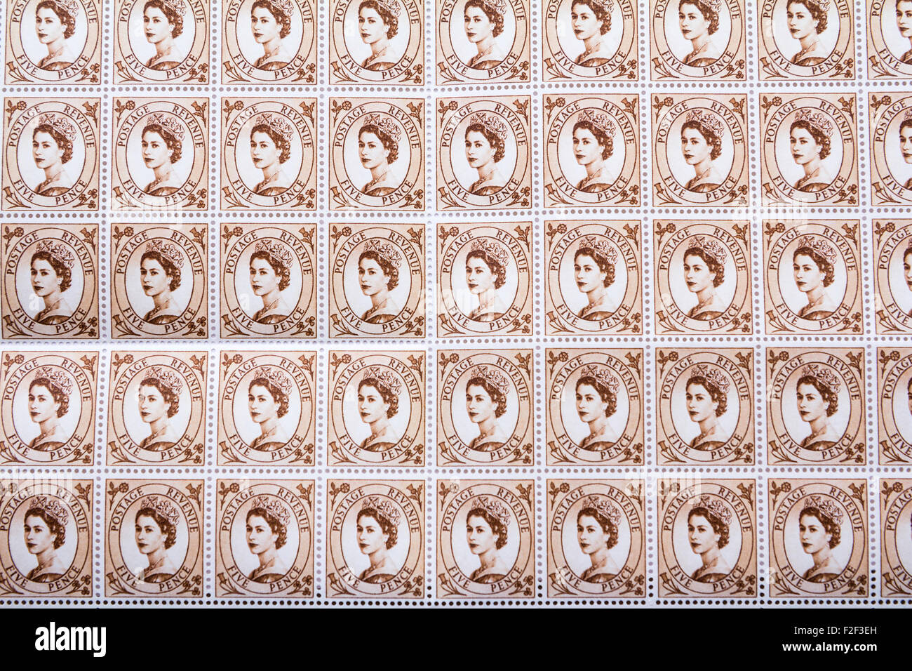 Sheet of 1950's British Royal Mail 5d light brown postage stamps from ...