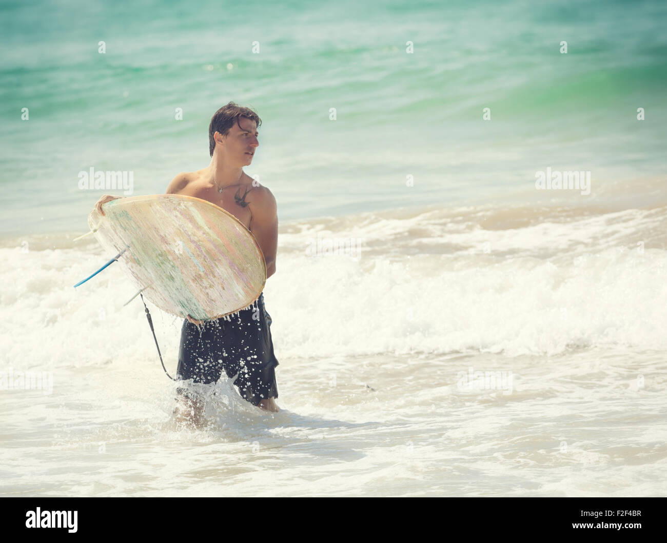 Portrait of Surfer with longboard on the beach Stock Photo - Alamy