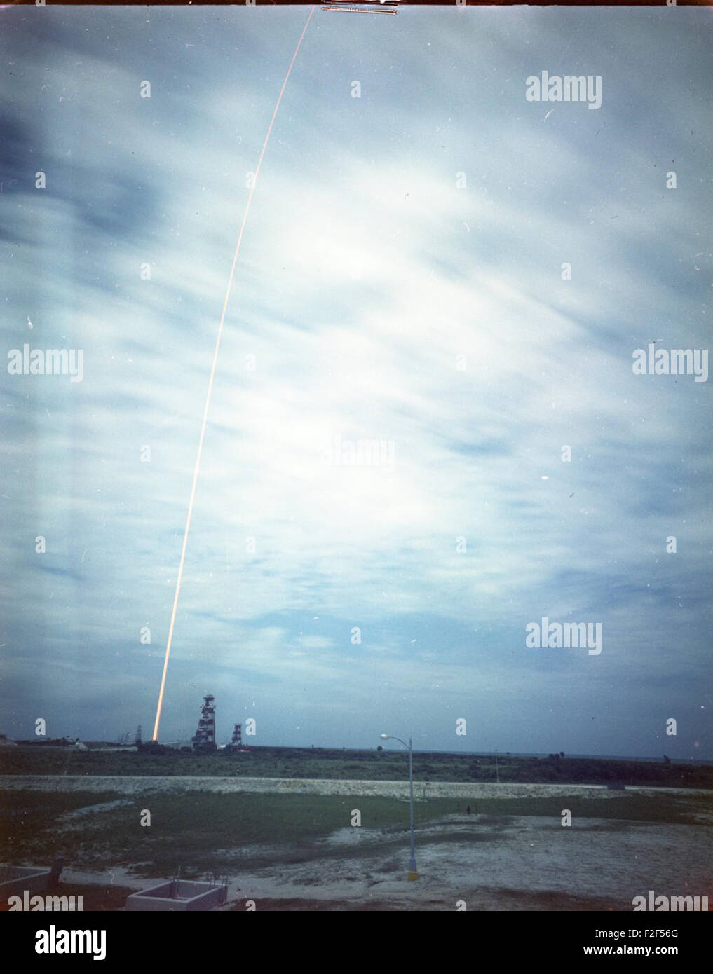 The Atlas 14D missile is shown in a dramatic firing streak, captured as ...