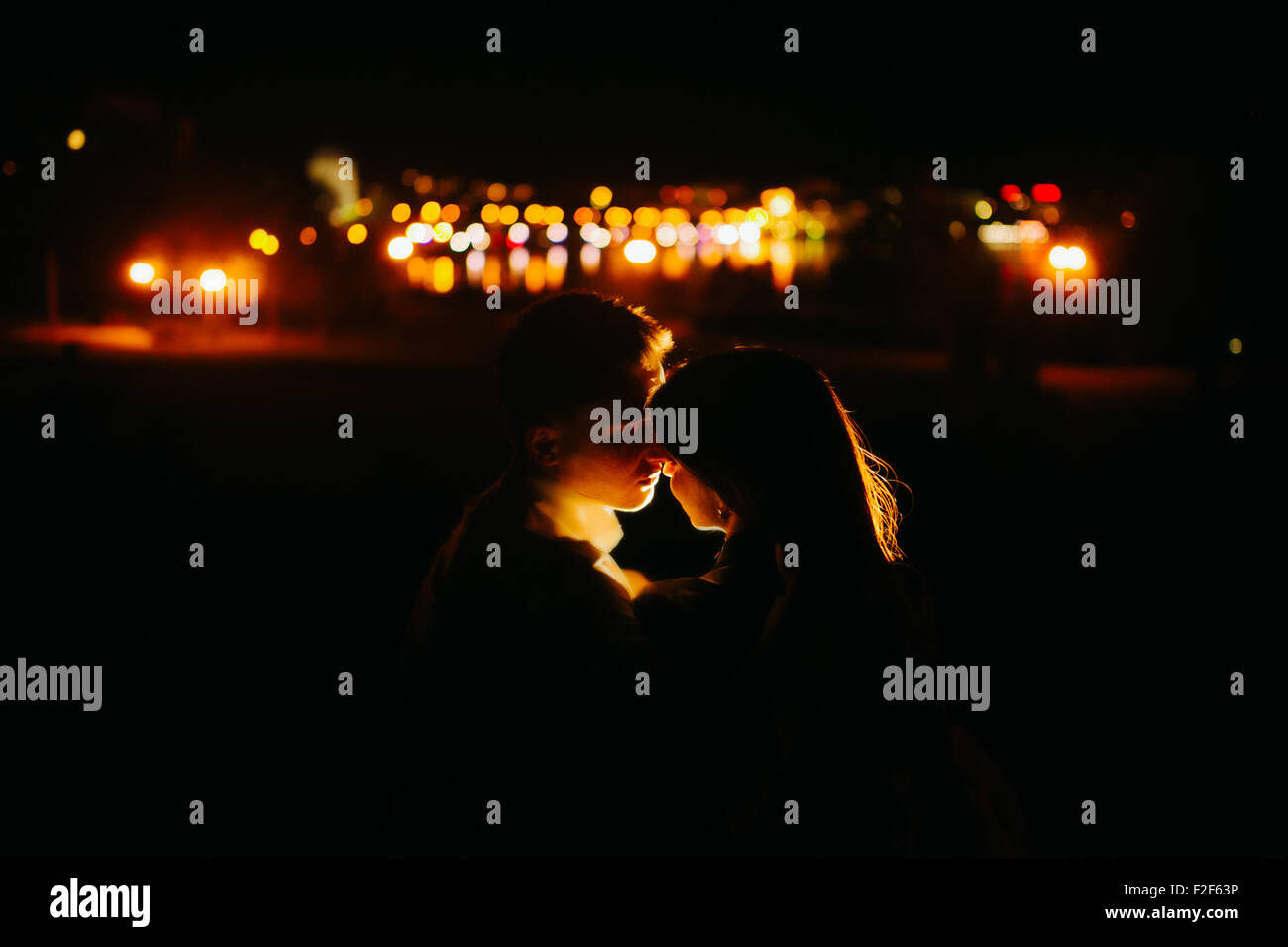 Couple at the night city Stock Photo - Alamy