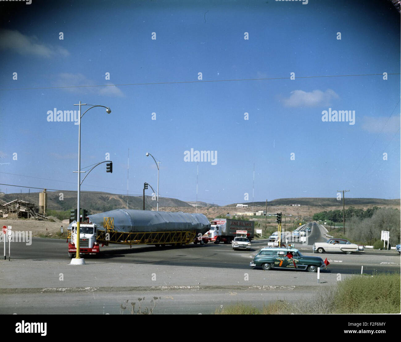 The Atlas 3C rocket is seen moving to the Air Force Munitions and Range ...