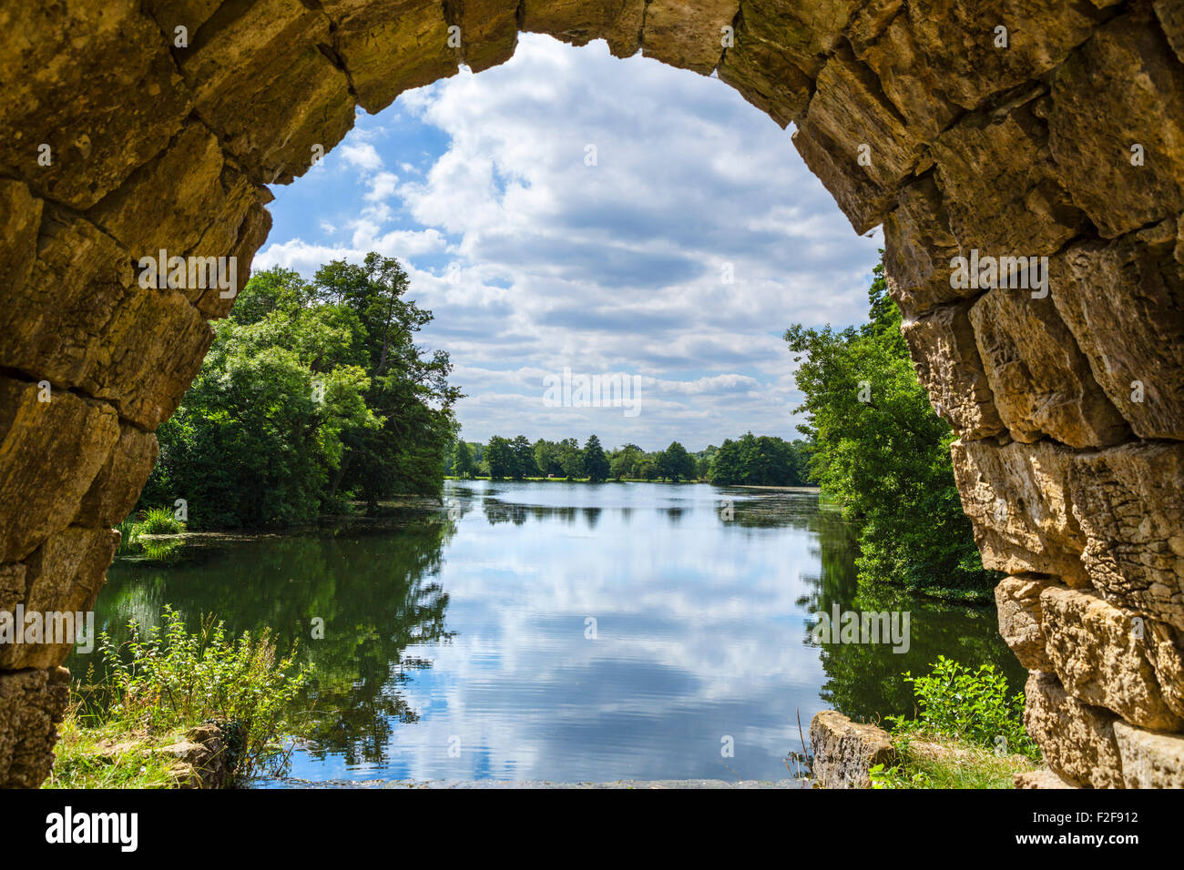View through arch at the Cascade and Artificial Ruins, Eleven Acre Lake ...