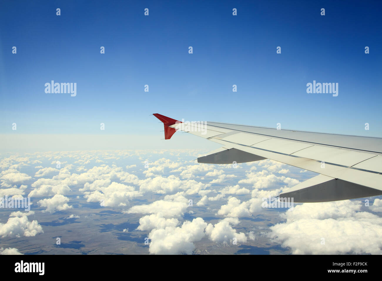 Wing of airplane from window Stock Photo - Alamy