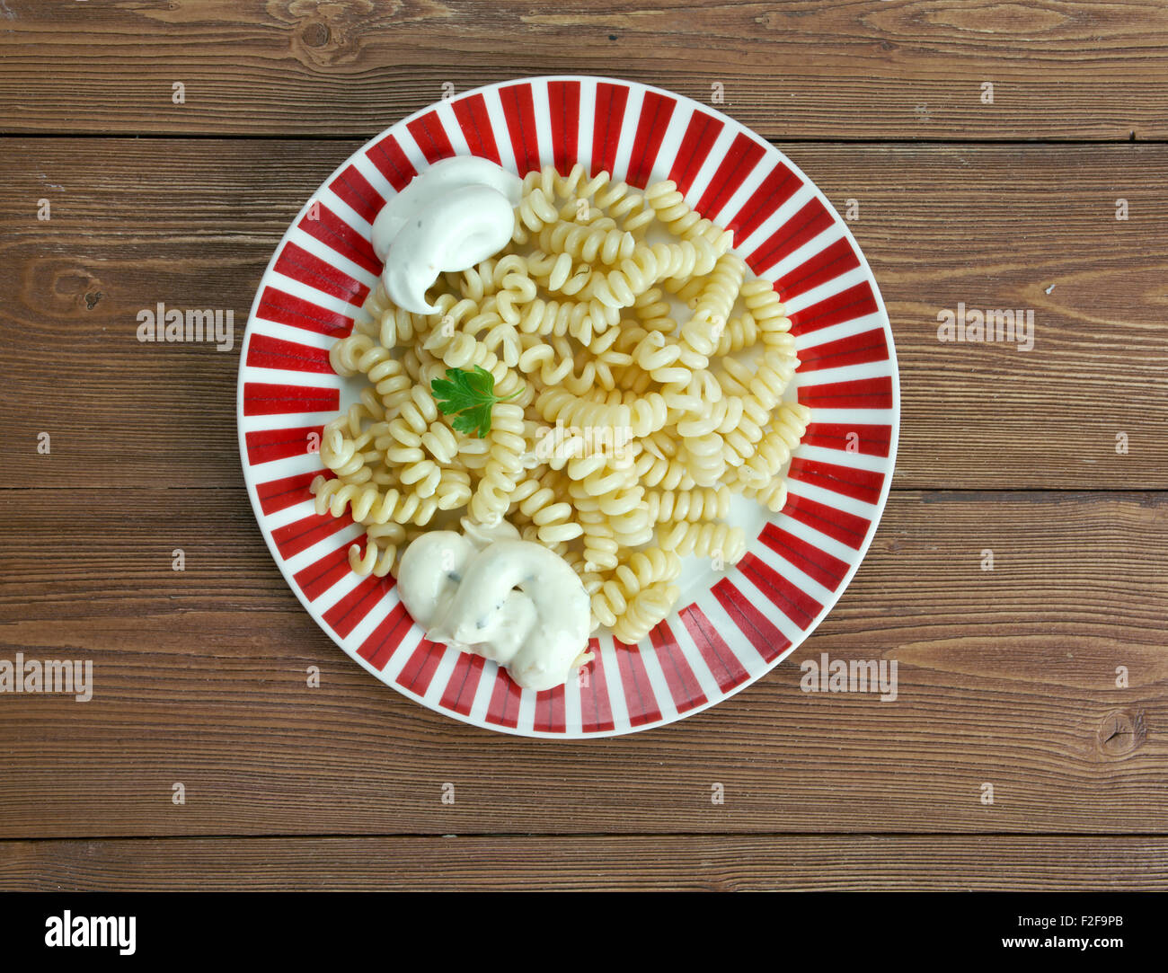 Fusilli - Italian pasta with cream sauce Stock Photo - Alamy