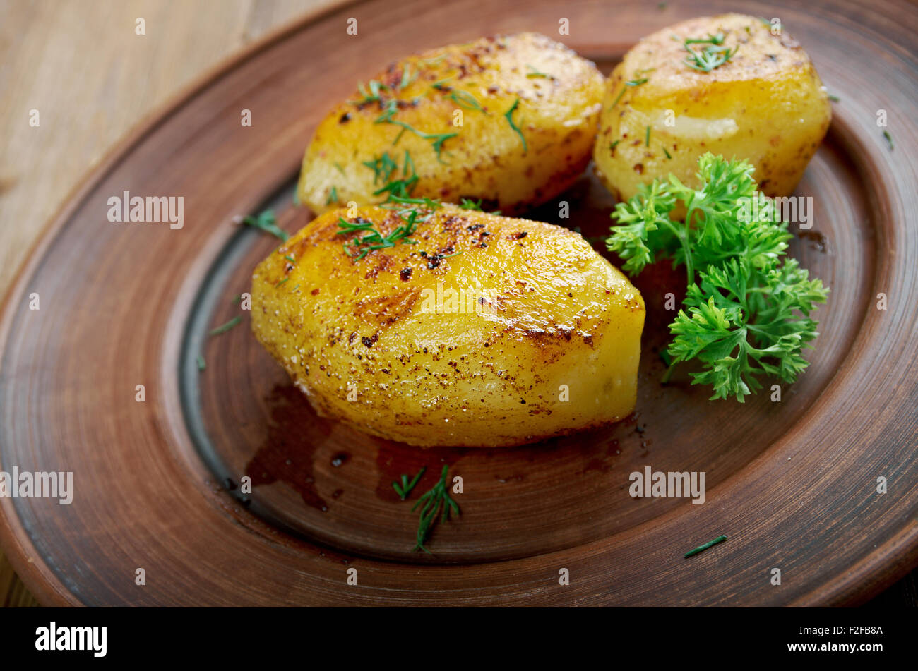 Imthawoma - Libyan potatoes in tomato sauce and spices Stock Photo - Alamy