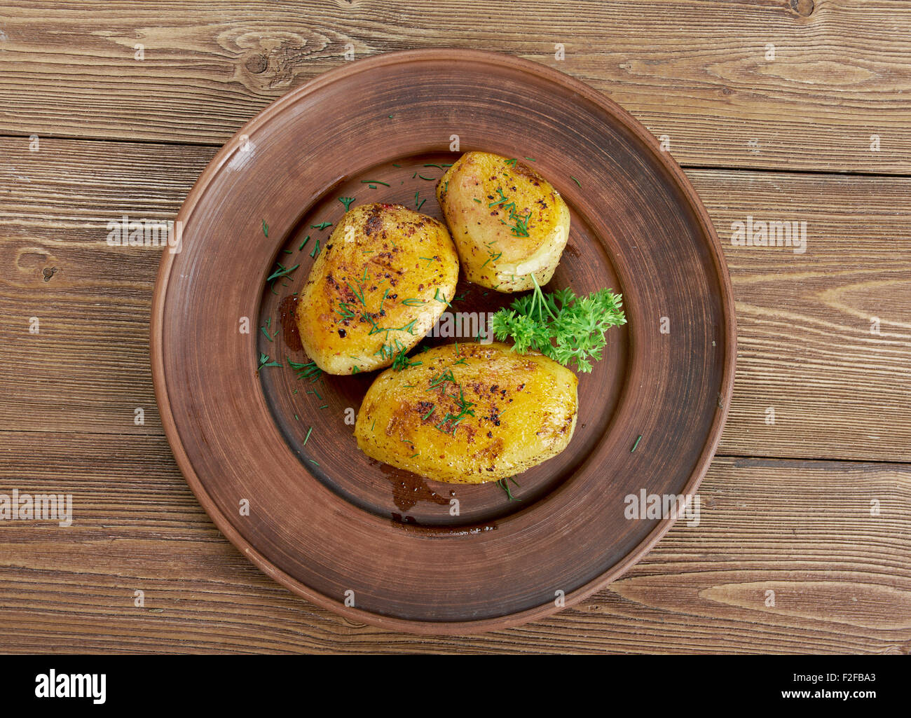 Imthawoma - Libyan potatoes in tomato sauce and spices Stock Photo - Alamy