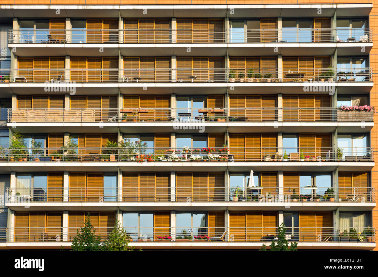 Facade with balconies of a modern apartment building Stock Photo - Alamy