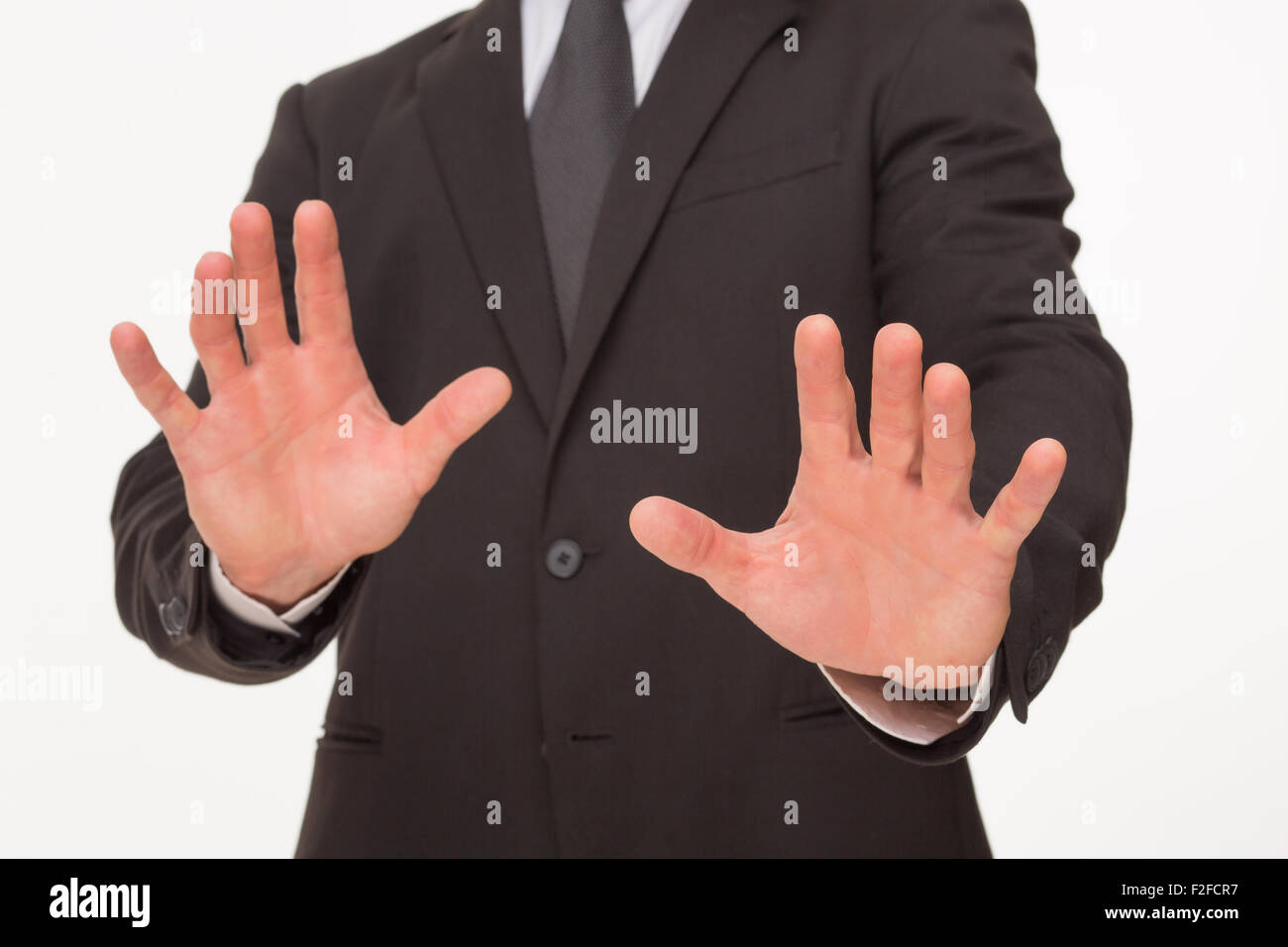 Businessman's gesture with hands Stock Photo - Alamy