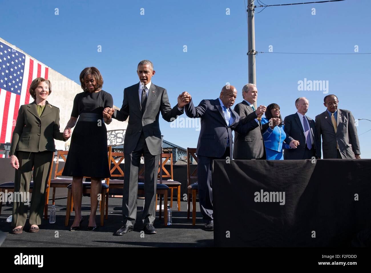 U.S. President Barack Obama holds hands with civil rights legend and ...