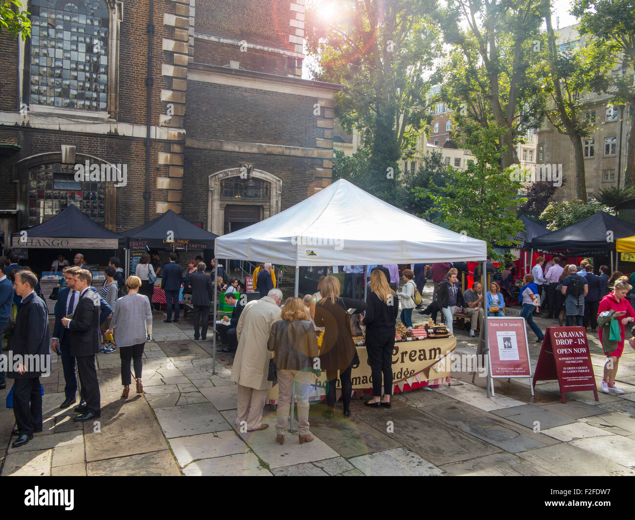 Food stalls at St James Church market in Piccadilly Stock Photo - Alamy