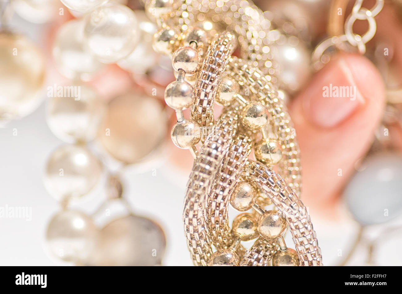 Expensive jewelry in woman's hand Stock Photo - Alamy