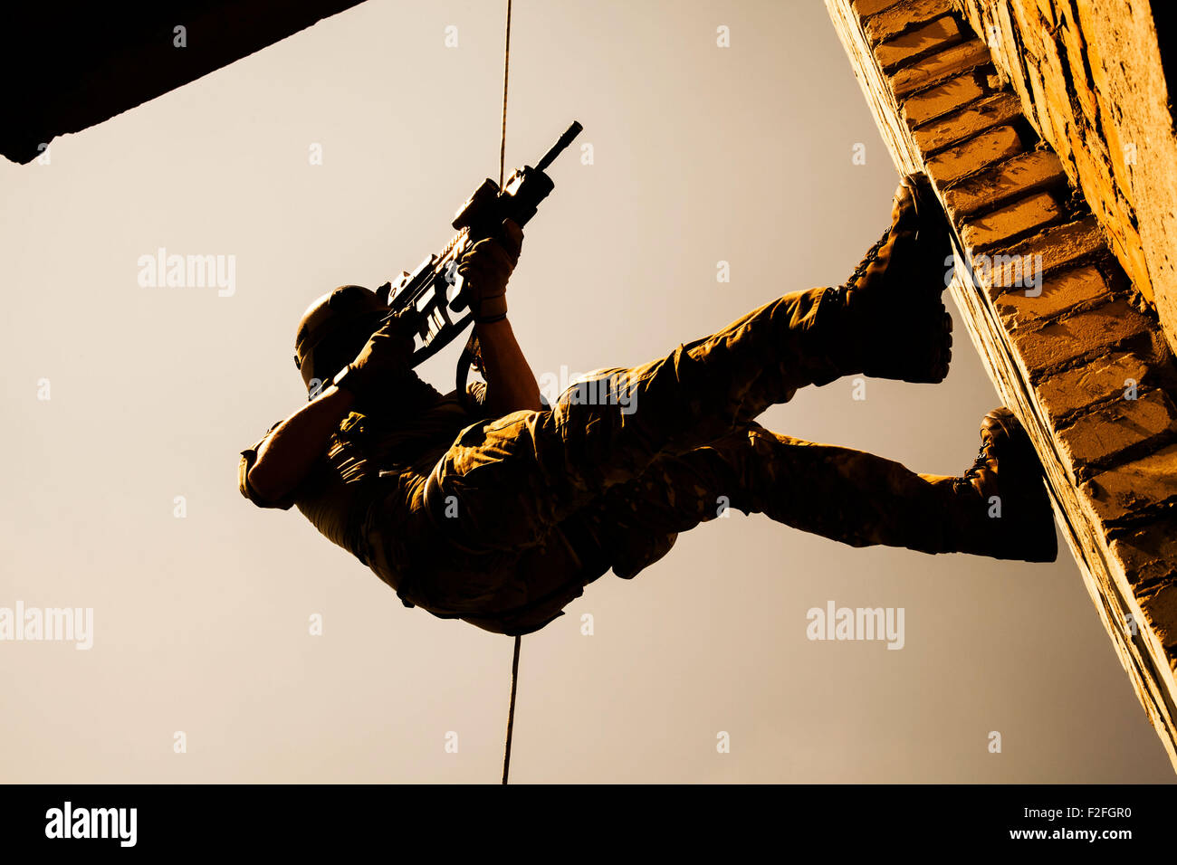 rappeling with weapons Stock Photo - Alamy