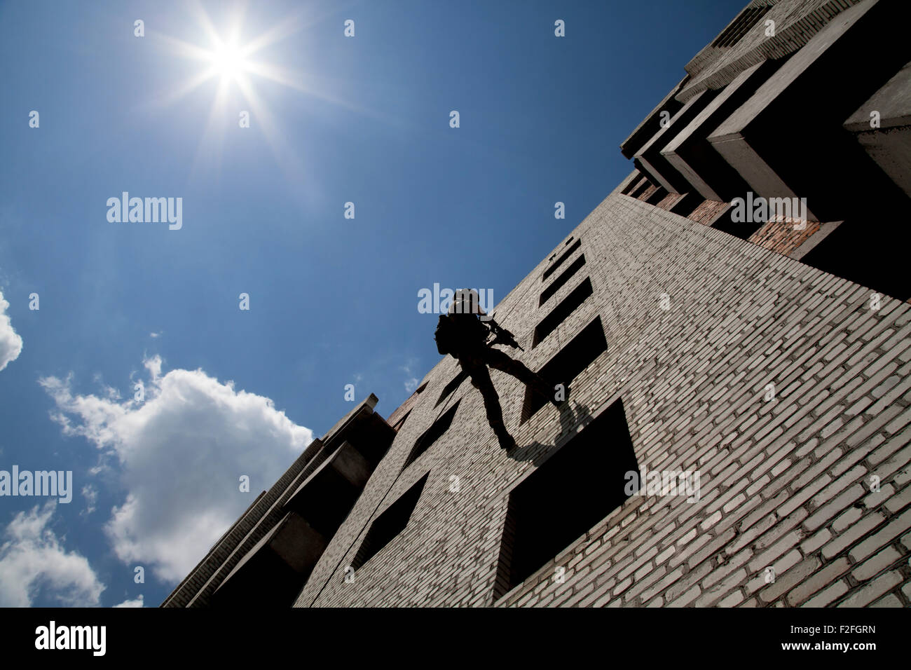 rappeling with weapons Stock Photo - Alamy