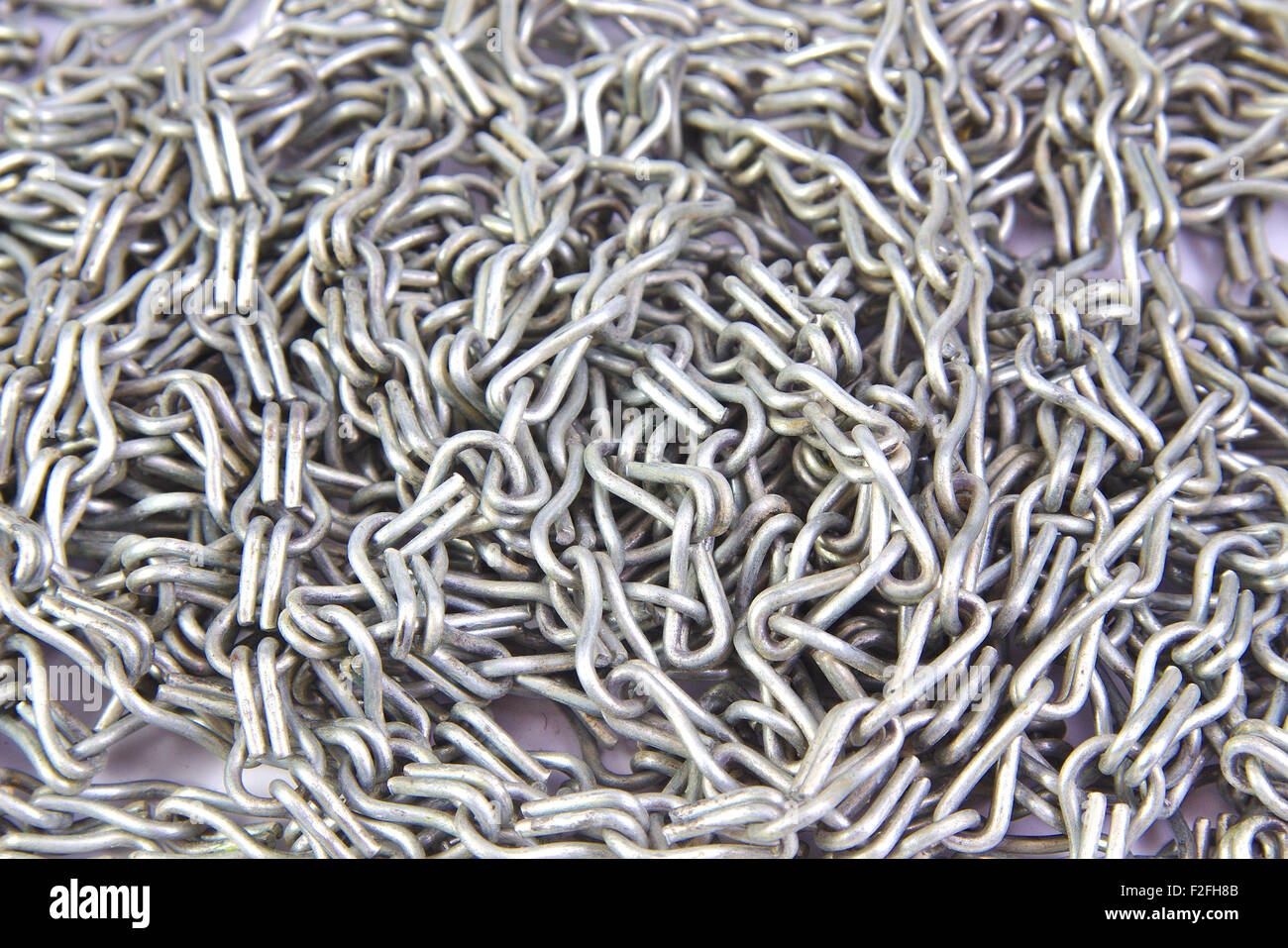 Silver steel chains texture as a background Stock Photo - Alamy
