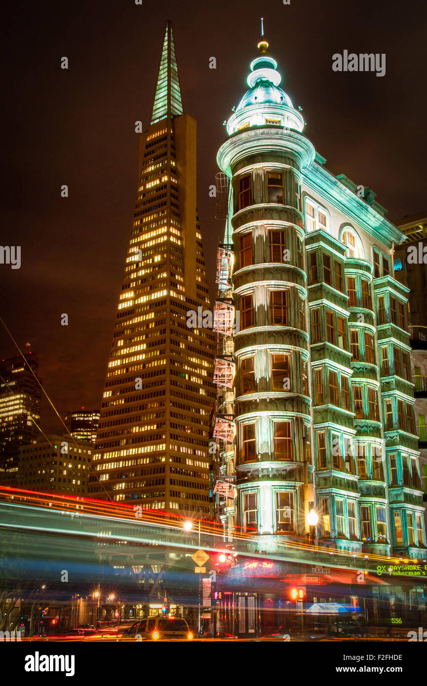 Buildings lit up at night in a city, Columbus Tower, Transamerica ...