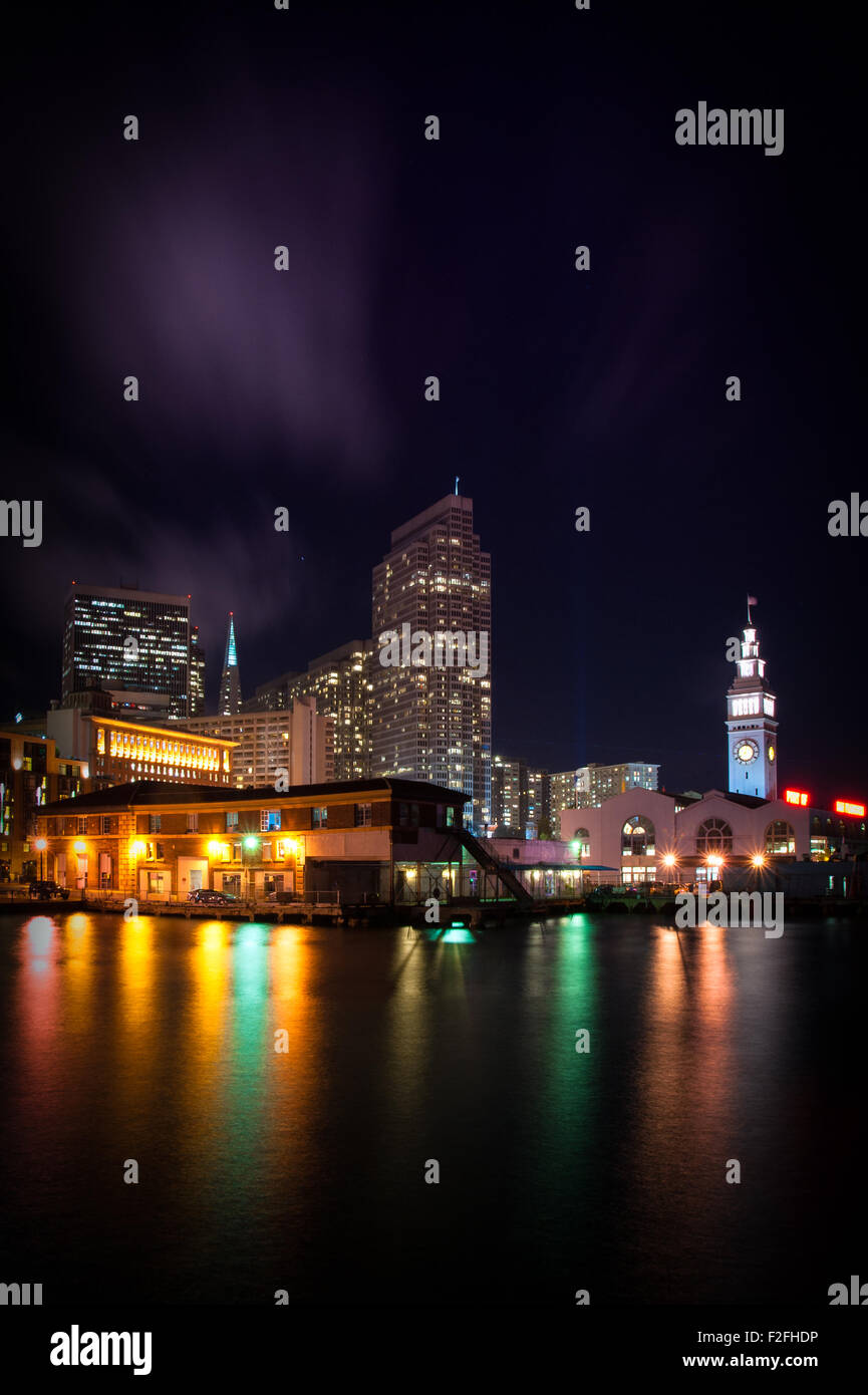 Clock tower of Ferry Building lit up at night, The Embarcadero, San ...