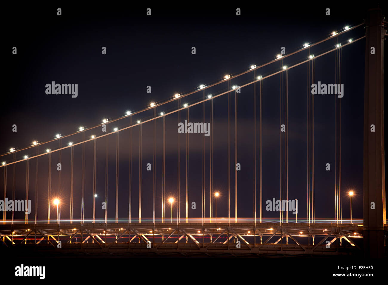 Suspension bridge lit up at night, Bay Bridge, San Francisco Bay, San ...