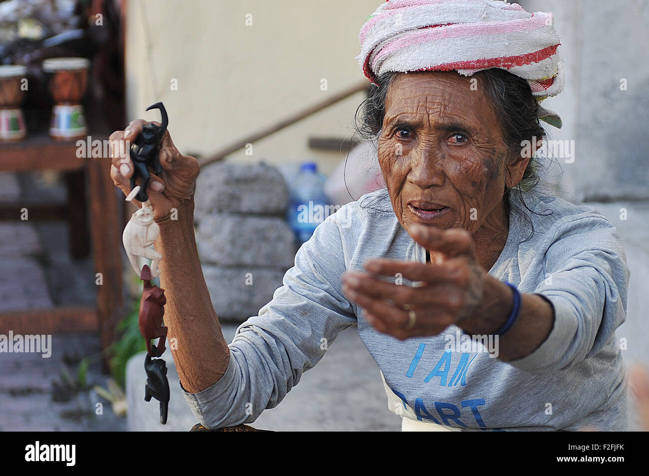 Local woman sell statues of monkeys souvenir in the Monkey forest ...