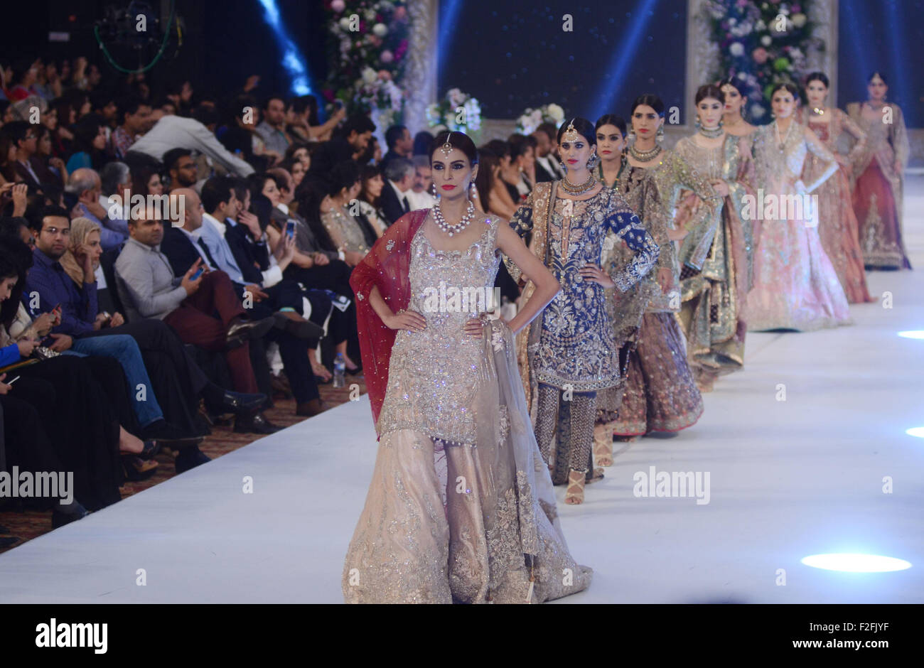 Lahore, Pakistan. 17th Sep, 2015. Pakistani models present creations by ...