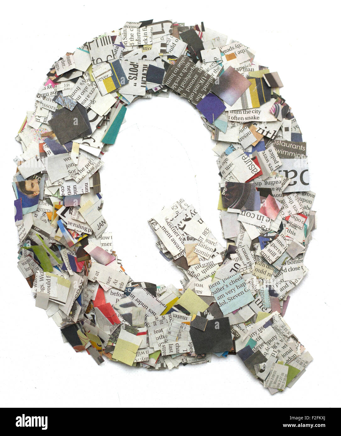 The letter Q made from newspaper confetti Stock Photo - Alamy
