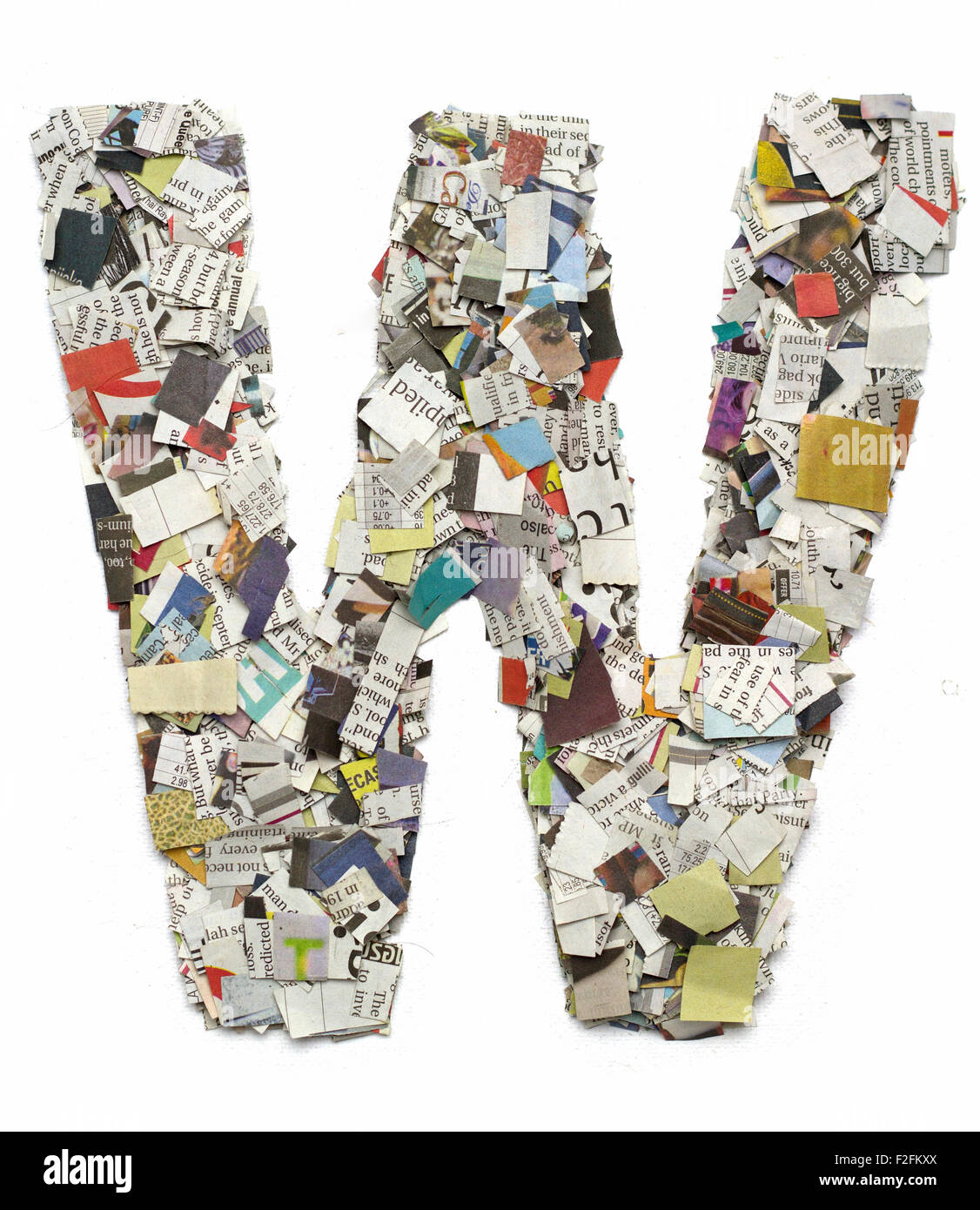 The letter W made from newspaper confetti Stock Photo - Alamy