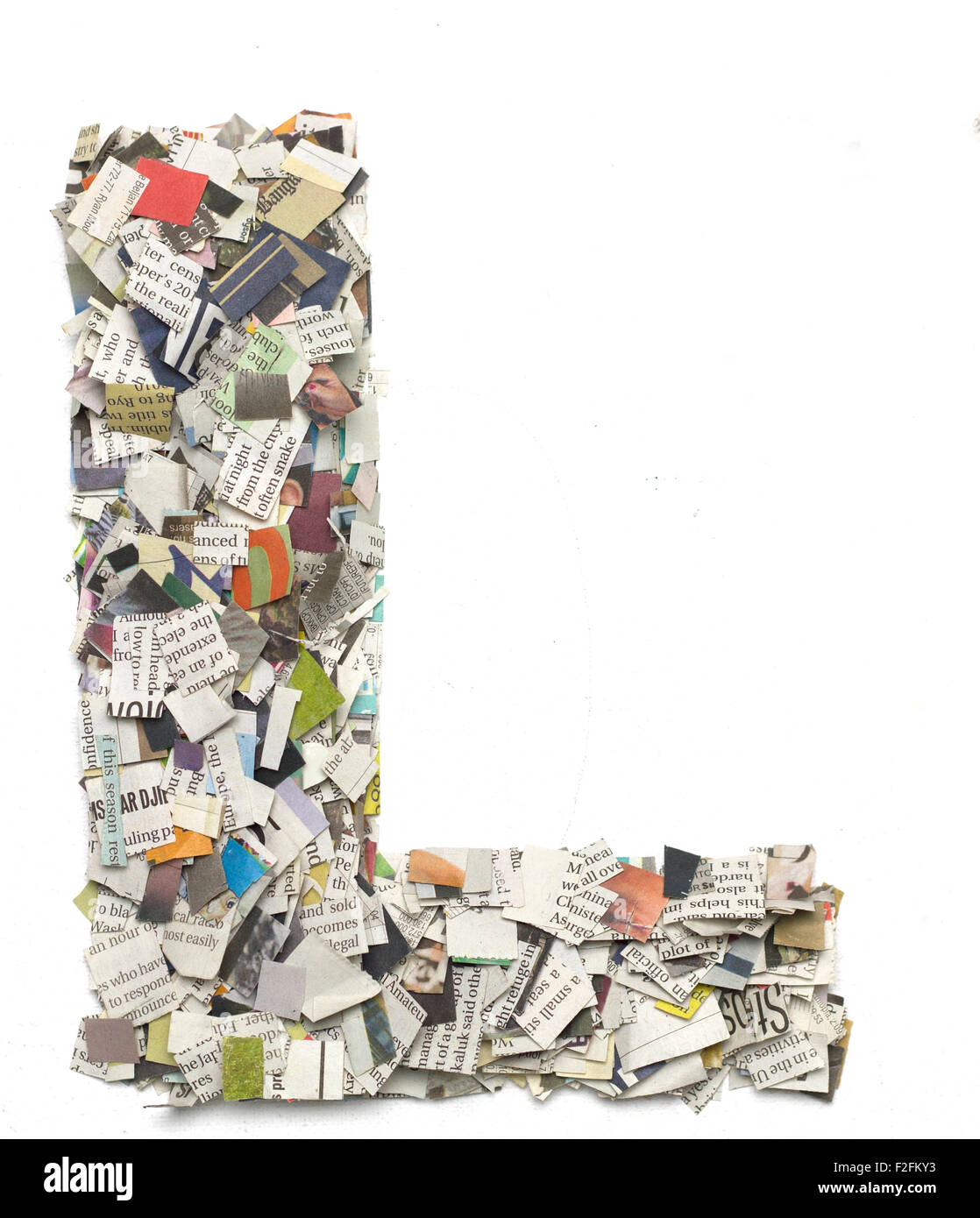 The letter L made from newspaper confetti Stock Photo - Alamy
