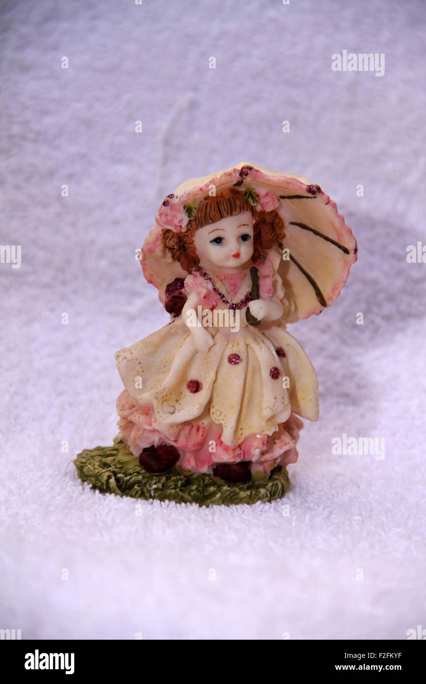 clay model of girl with umbrella Stock Photo - Alamy