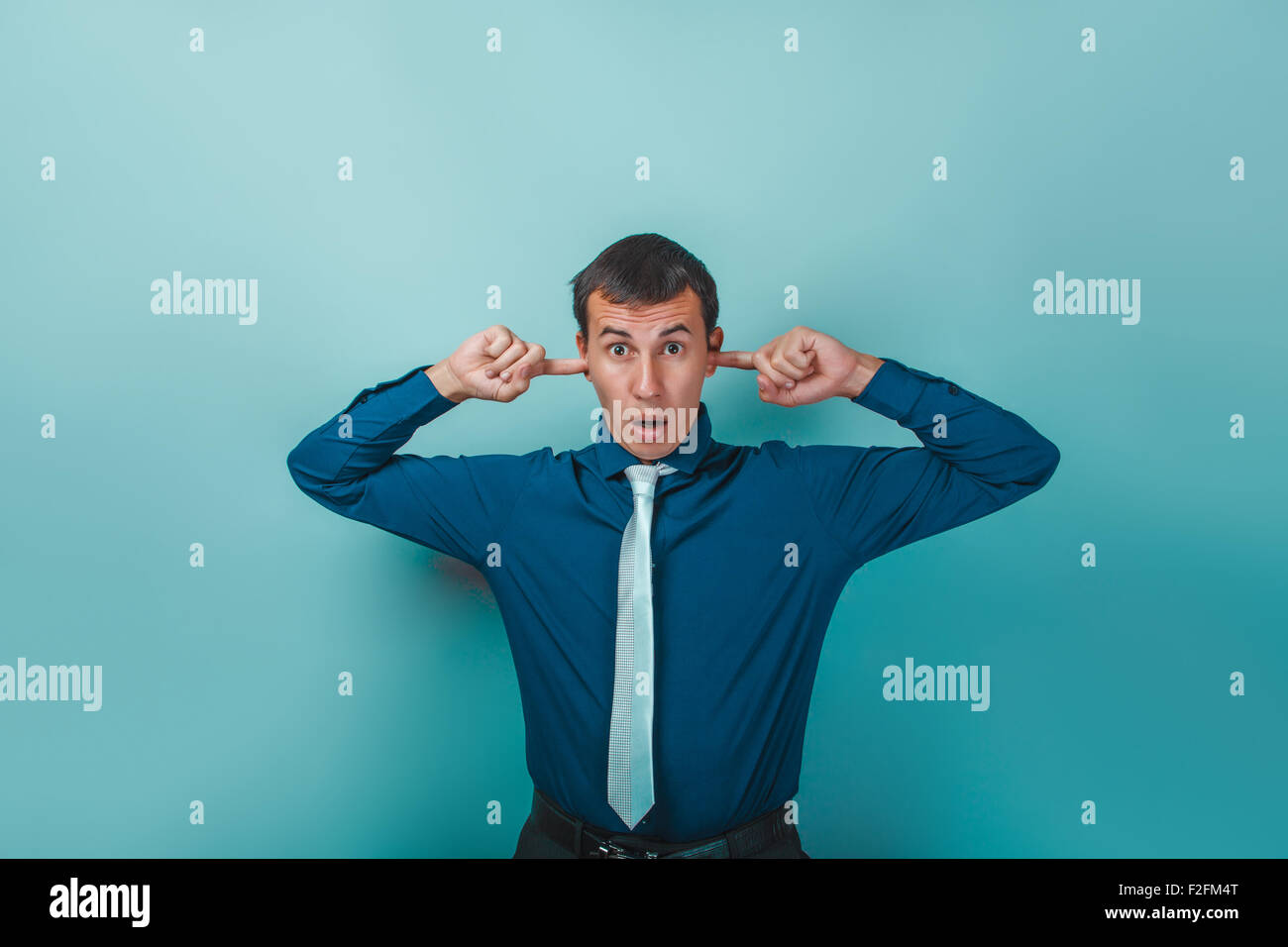 a man of European appearance thirty years his ears fingers on a Stock ...