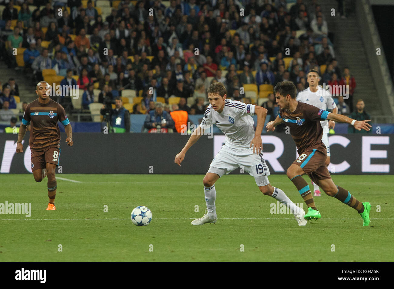 Kiev, Ukraine. 16th Sep, 2015. Denys Garmash (C) of Dynamo vies for a ...