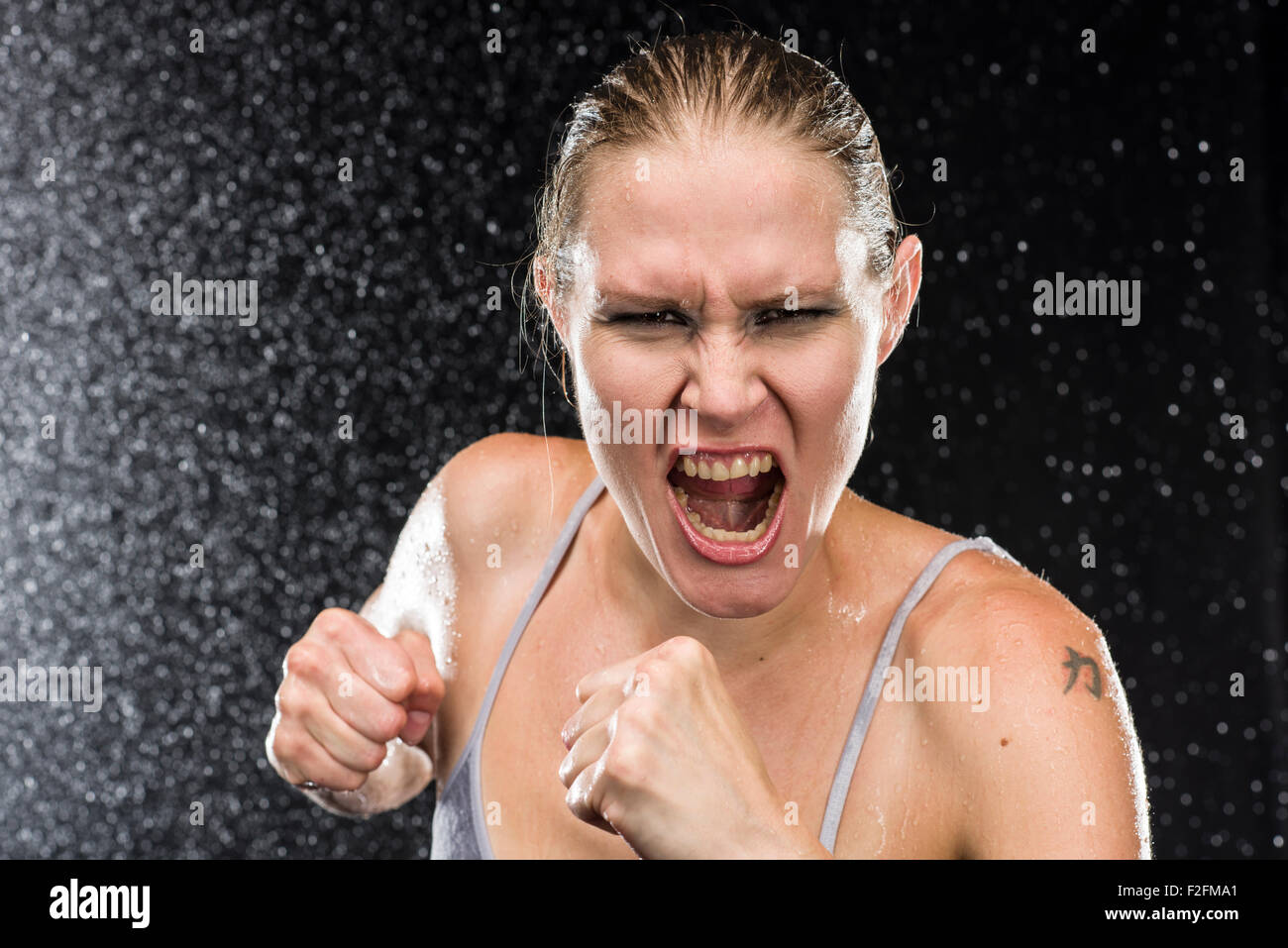 Female Fighter Shouting Out Loud at the Camera Stock Photo - Alamy