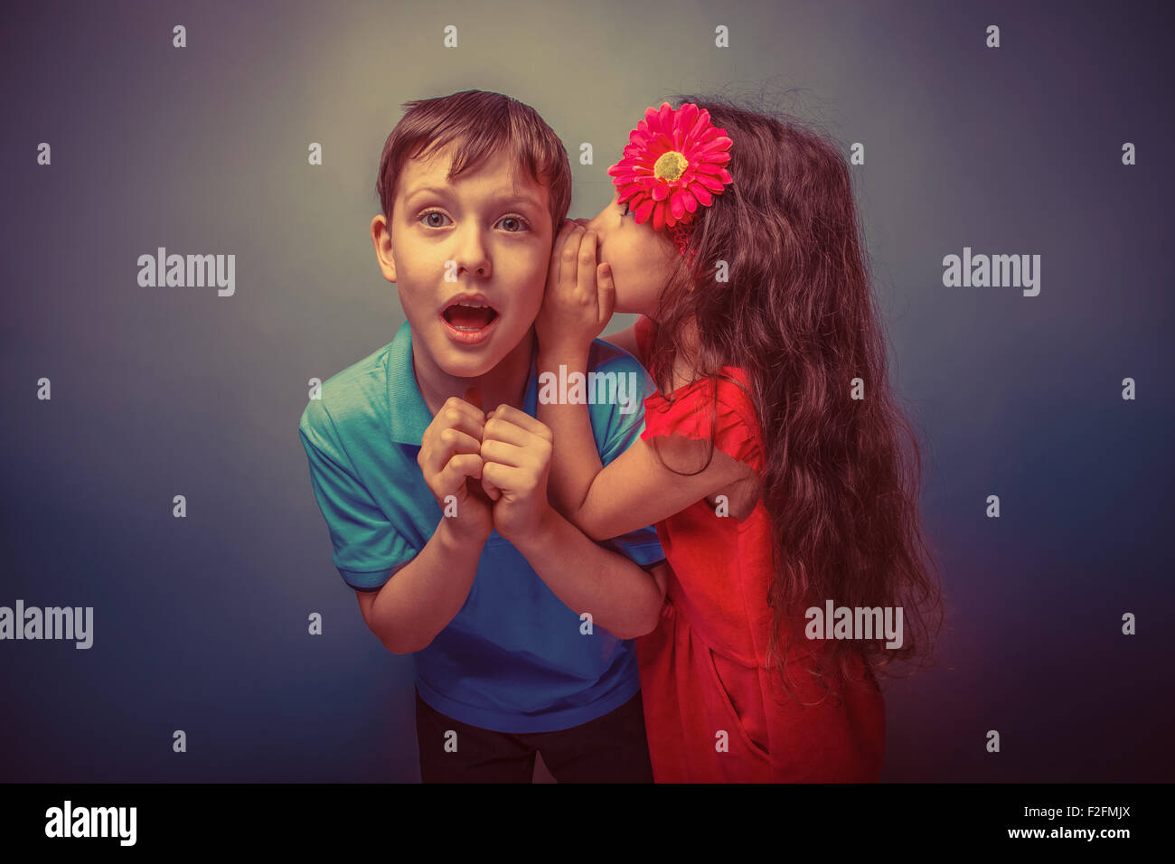 Whispering secret in ear hi-res stock photography and images - Alamy