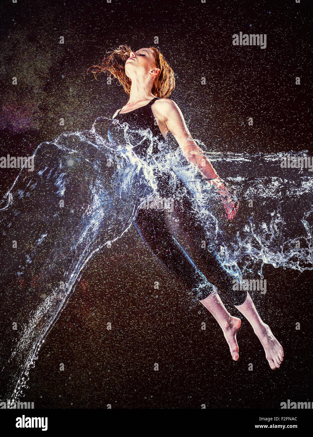 Thoughtful Woman in Water Splash Floating in Air Stock Photo - Alamy