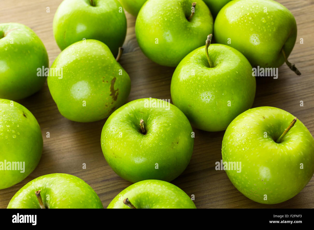 Organic apples fresh from the farm on wood table Stock Photo - Alamy