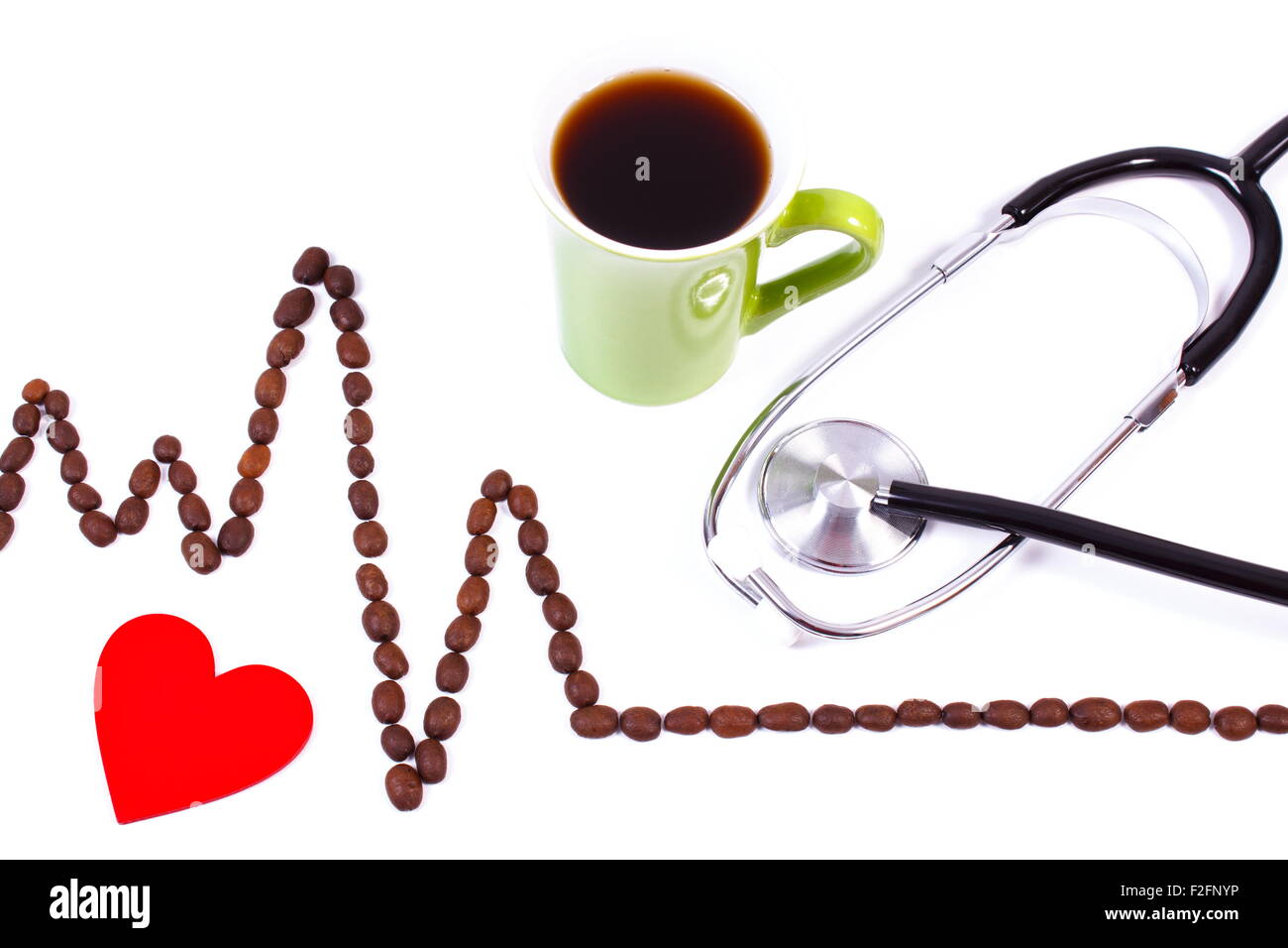 Electrocardiogram line of roasted coffee grains, cup of coffee and ...