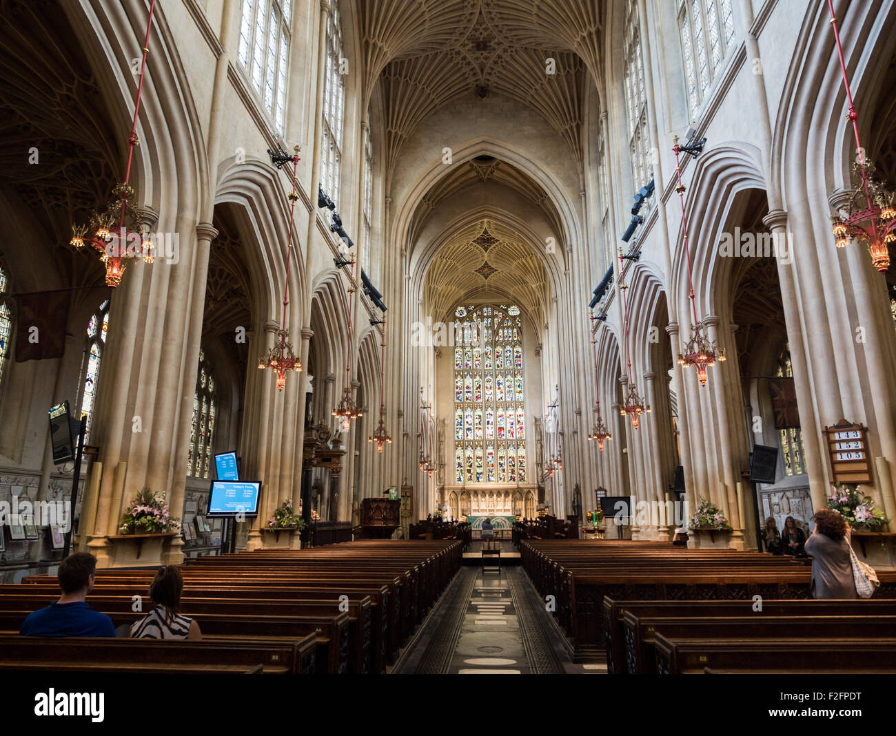 Inside Bath Abbey looking East towards the stain glass window Stock ...