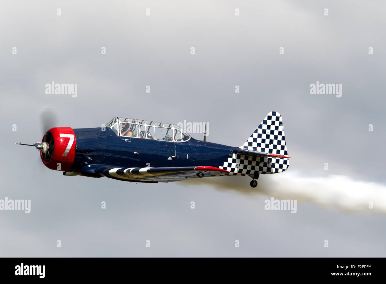 Old Swedish Saab Sk 16 propeller fighter plane flying past and puts out ...