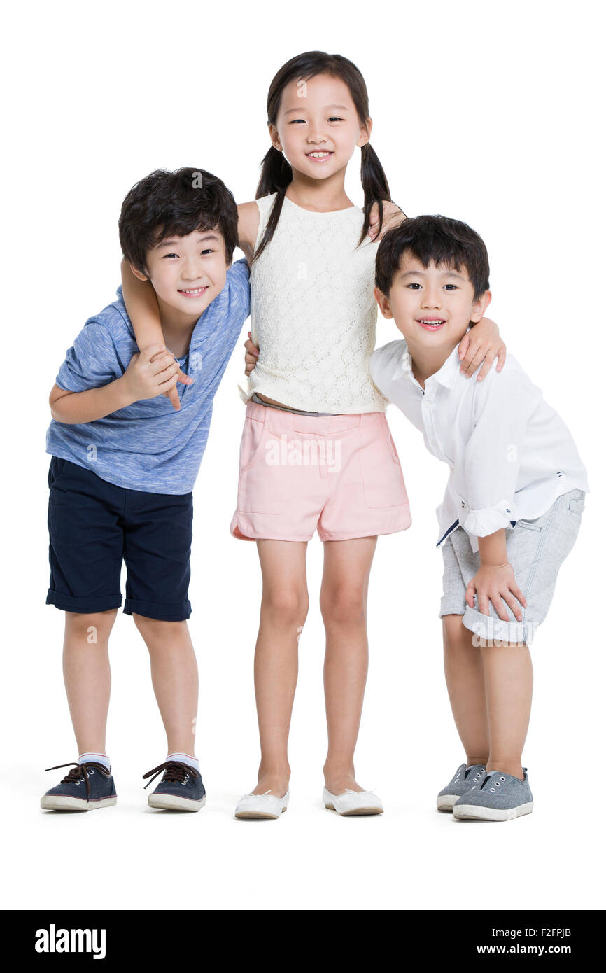 Three happy children playing on Cut Out Stock Images & Pictures - Alamy