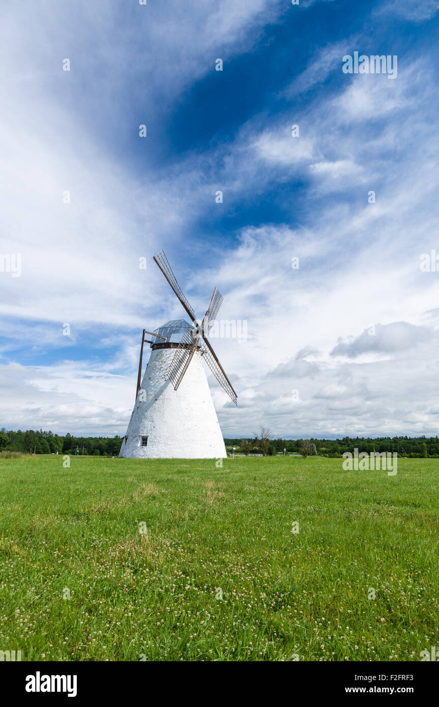 Scenic windmill on meadow, summertime rural landscape Stock Photo - Alamy