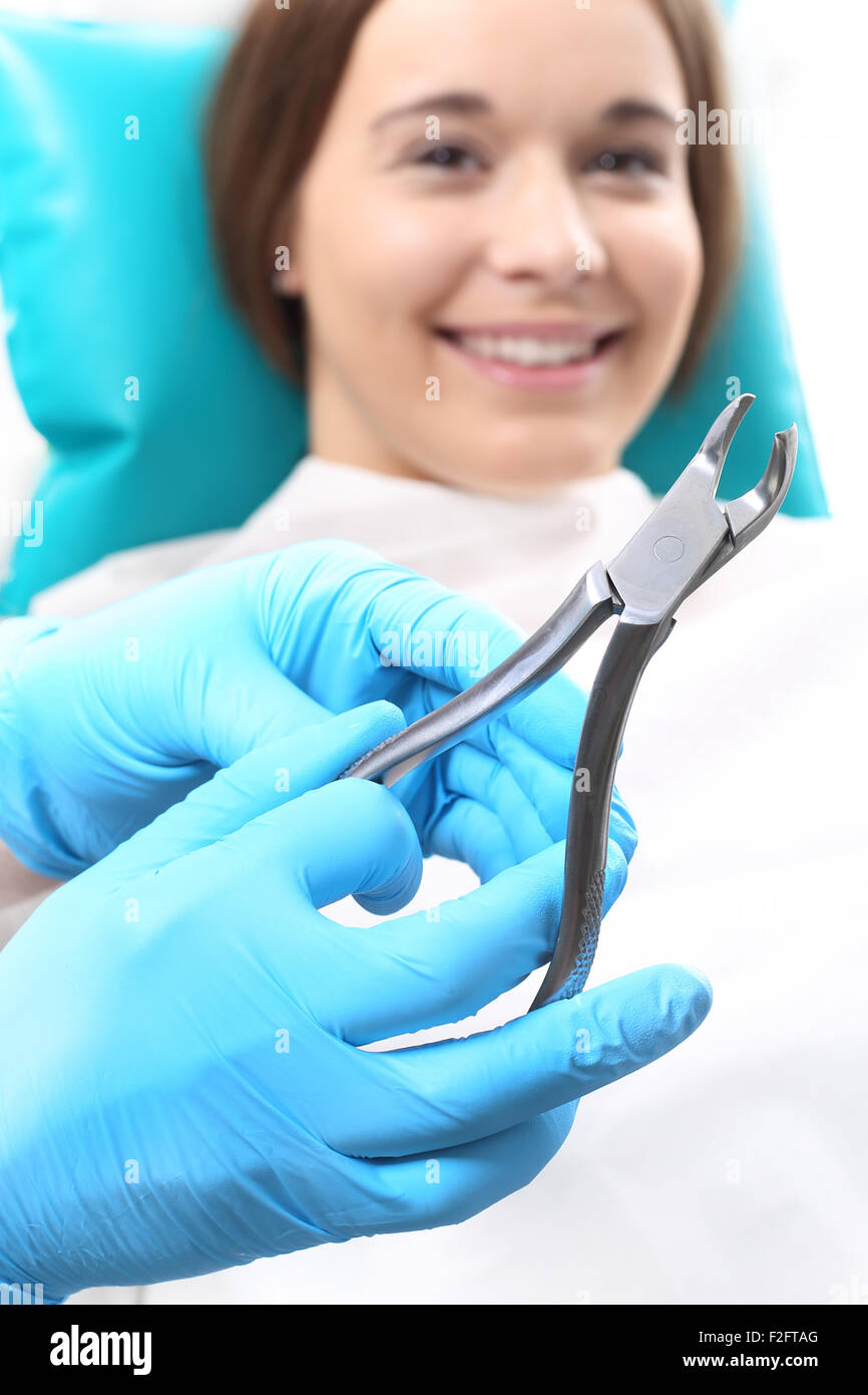 Dentistry, plucking, chiselling carious tooth Stock Photo - Alamy