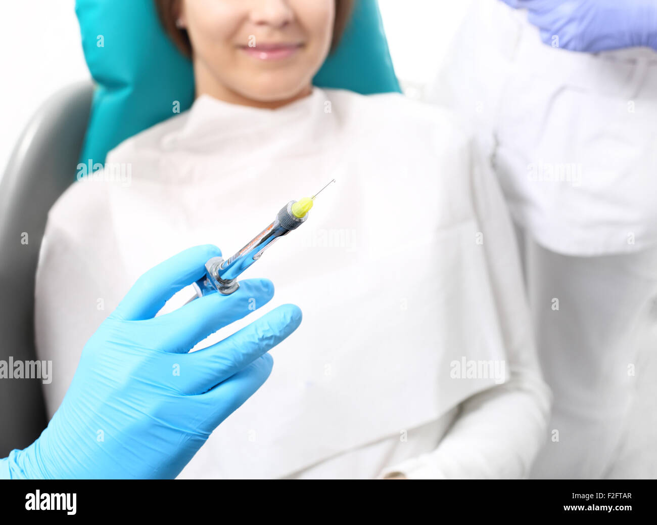 Analgesic injection, the woman at the dentist. Woman to the dentist ...