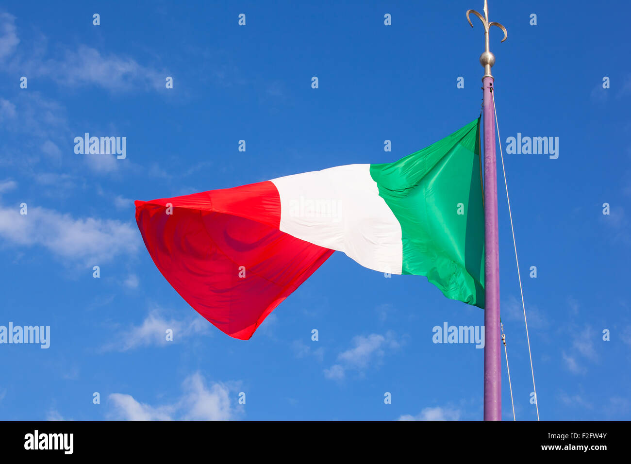 View of italian flag blowing in the wind Stock Photo - Alamy