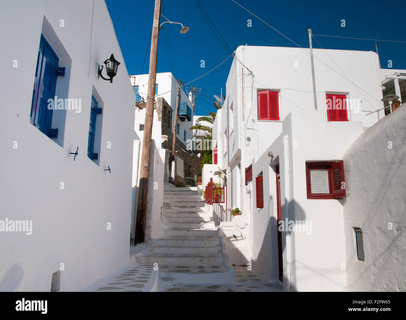 Pretty alley in old town of Mykonos, Greece Stock Photo - Alamy