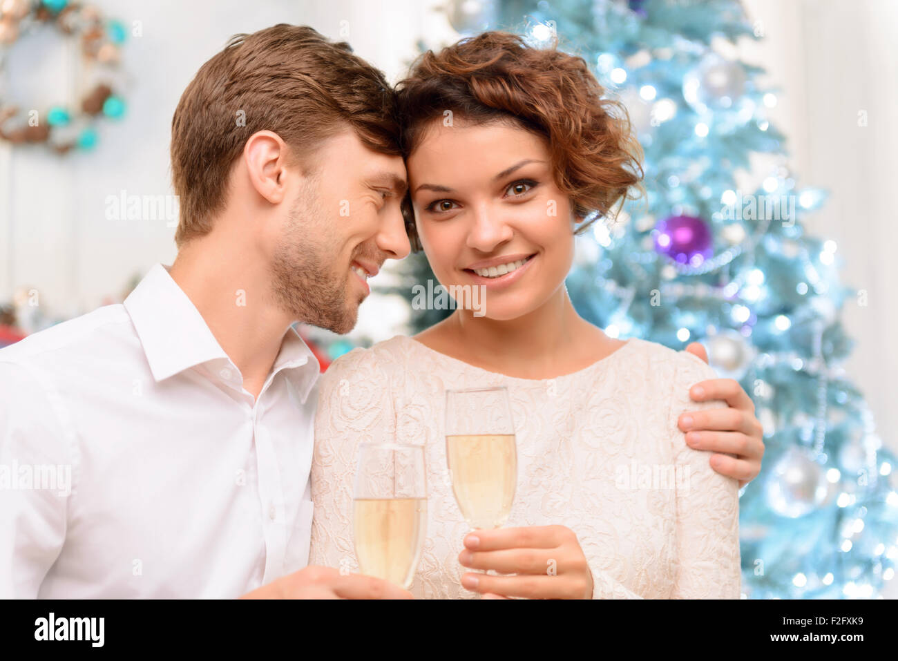 Loving couple drinking champagne Stock Photo - Alamy