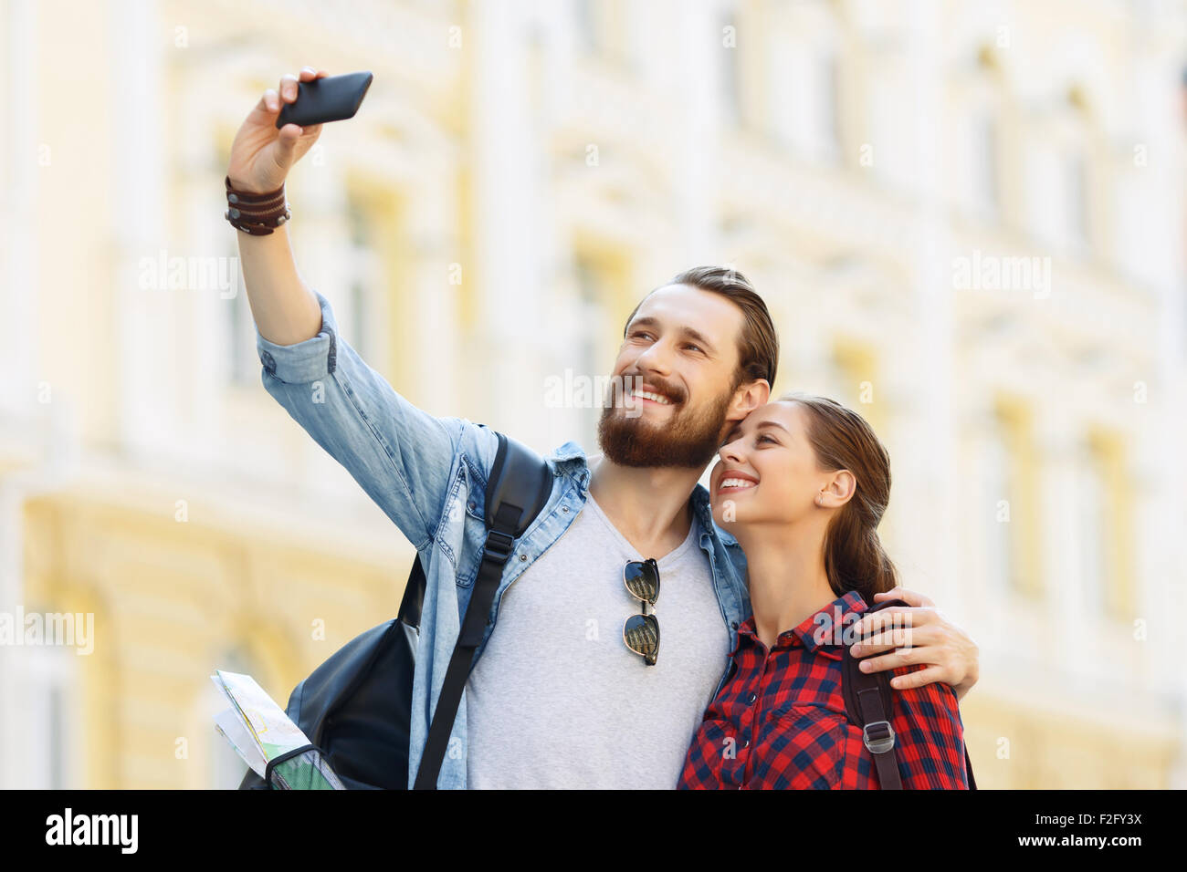 Happy tourists making selfie Stock Photo - Alamy