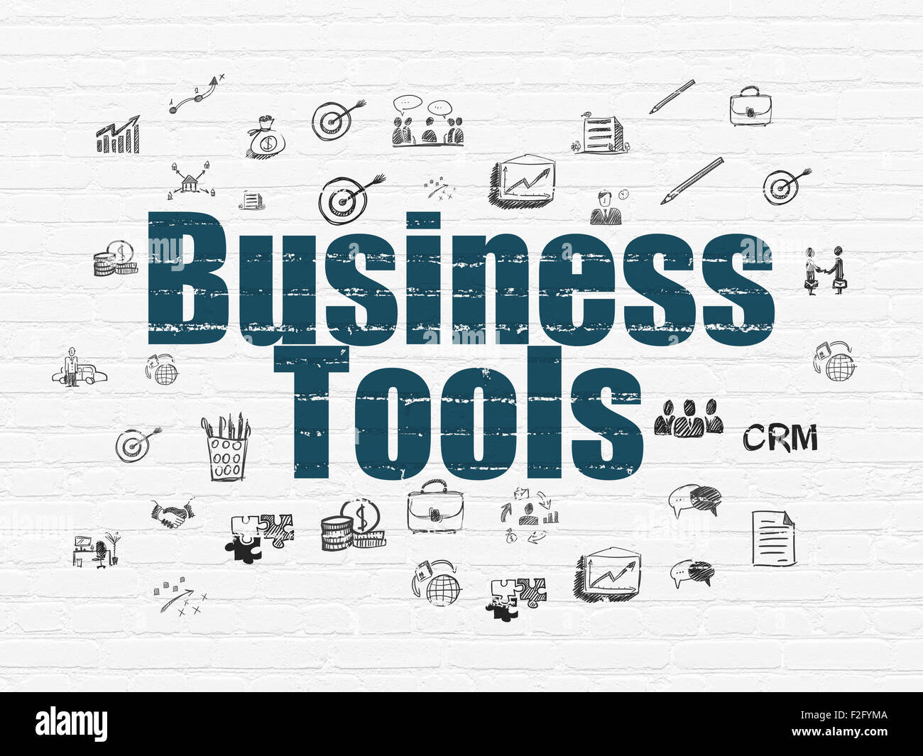 Business concept: Business Tools on wall background Stock Photo - Alamy